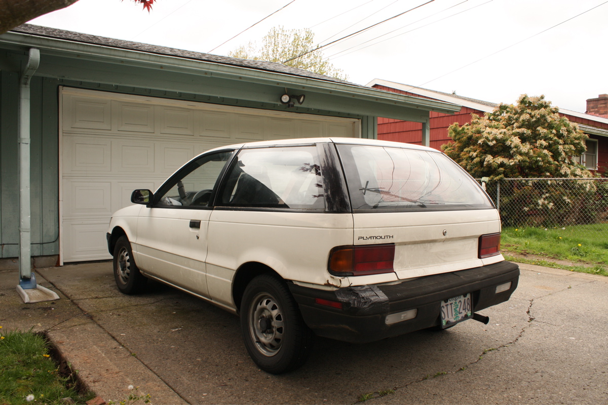 OLD PARKED CARS.: Colt Cult: 1992 Plymouth Colt Hatchback...