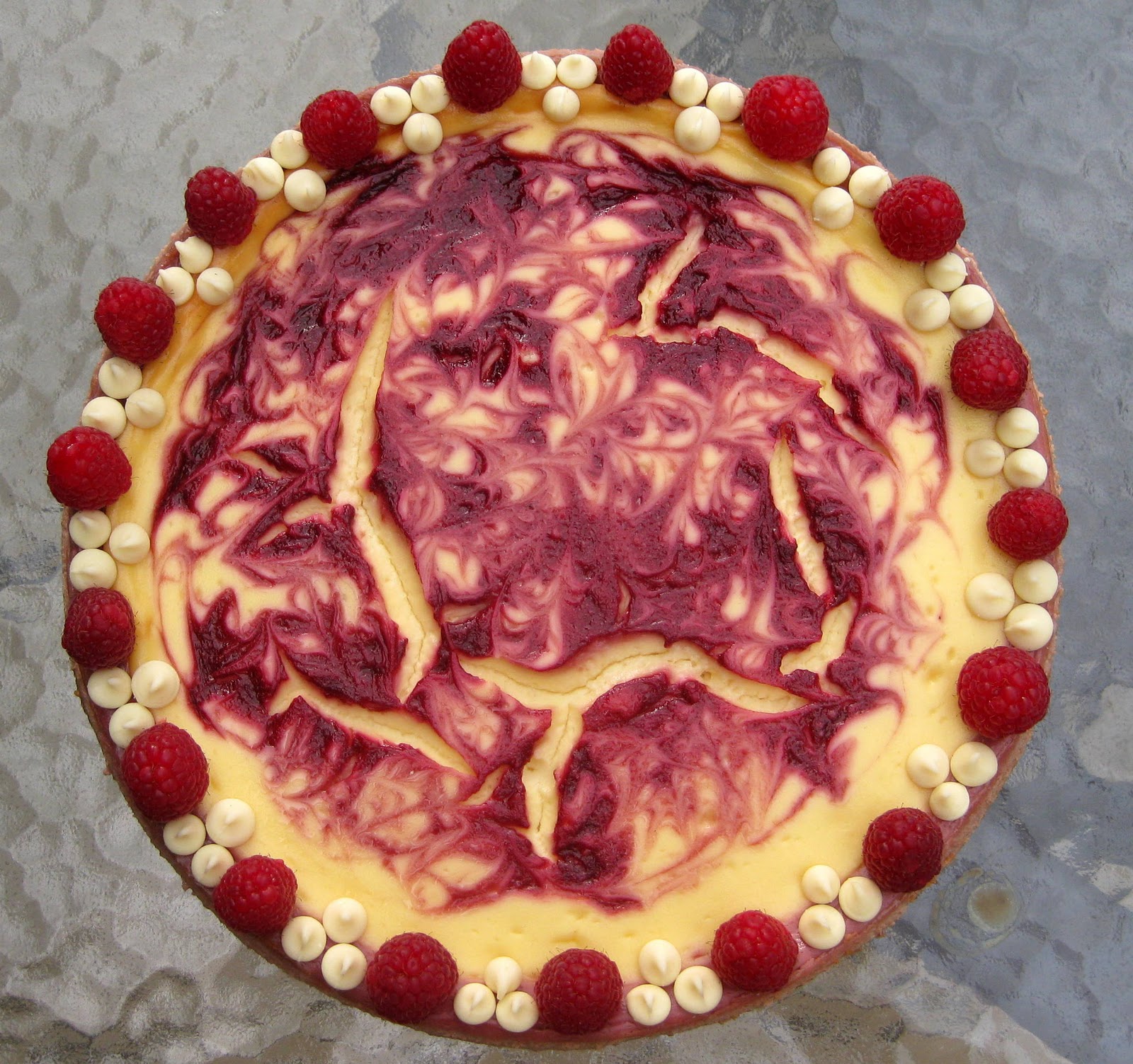 Food for Thought: White Chocolate and Raspberry Swirl Cheesecake
