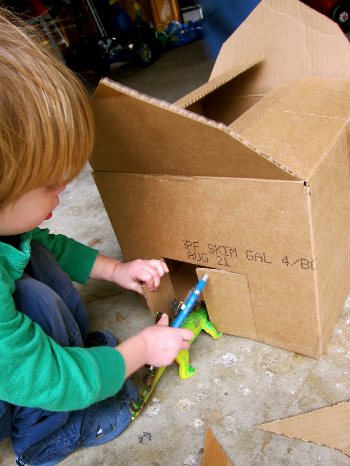 A Little Red Cardboard Barn