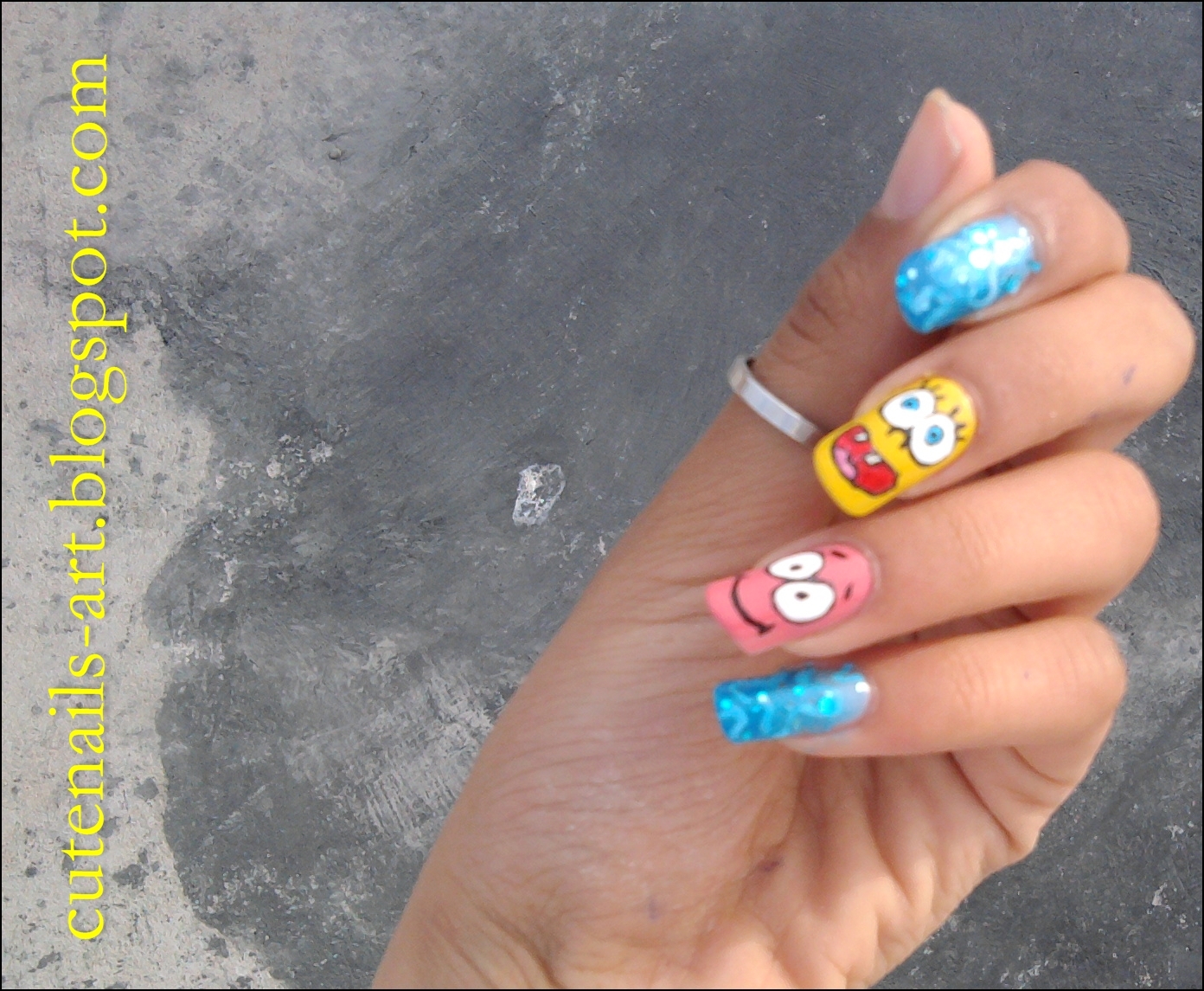 cutenails-art: Cartoon nails :SpongeBob inspired nail art