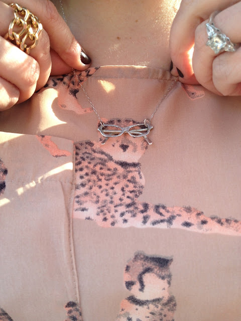 behind the leopard glasses: literally leopards in glasses