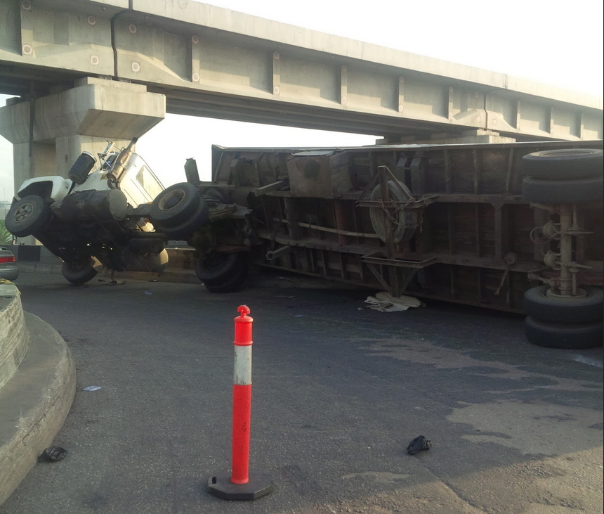 Photos: Truck & Container Fall Off Bridge In Ijora Lagos, 3 Injured ...