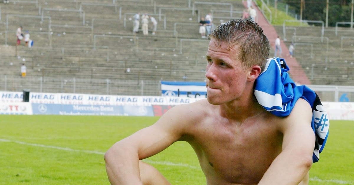 Boys in short shorts: Fit footie player in shorts