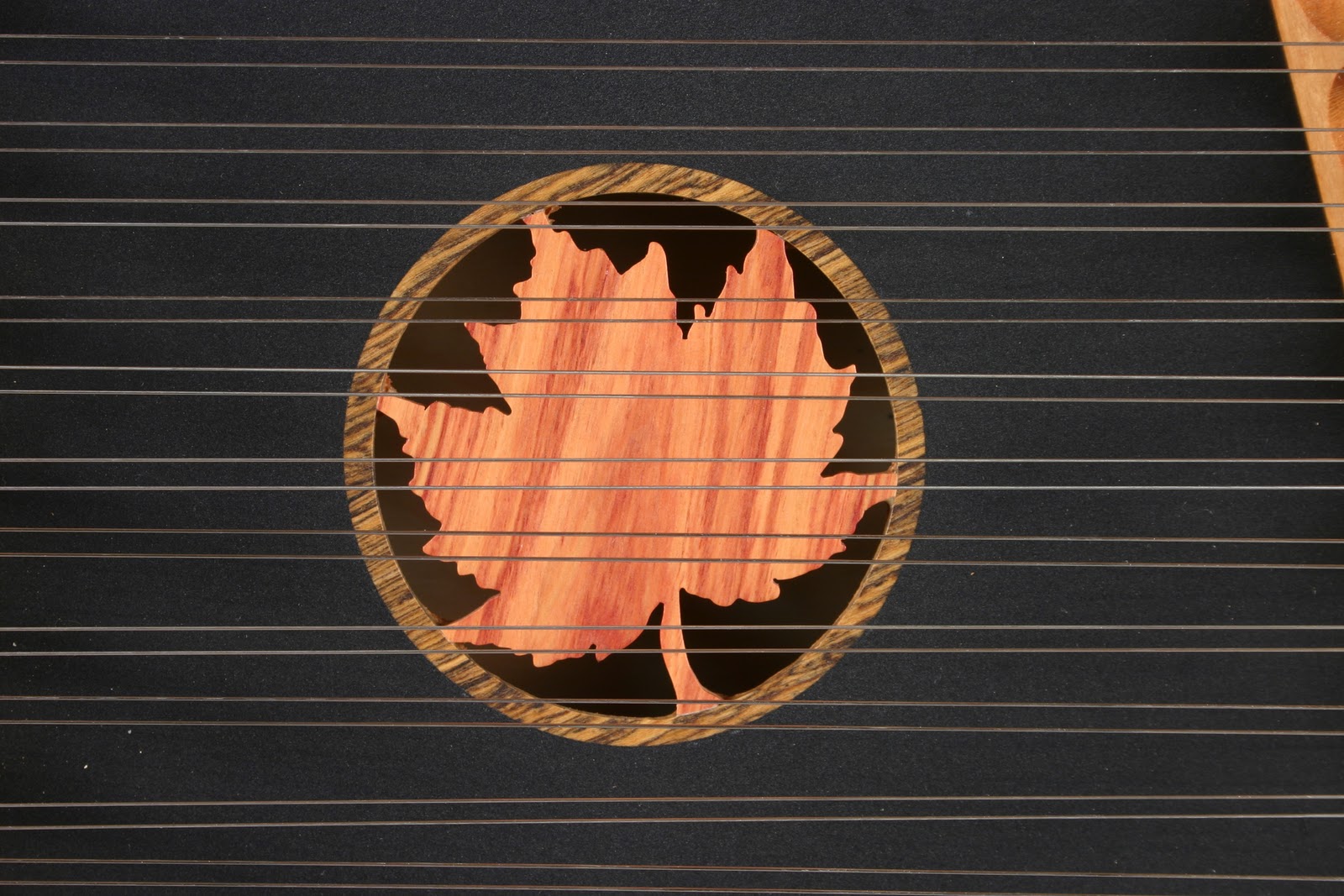 James Jones Instruments: Sound Hole Designs