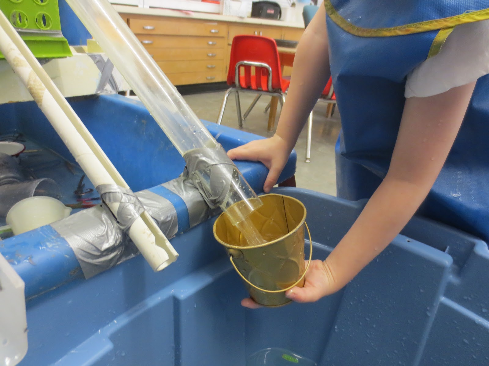 SAND AND WATER TABLES: WORM SLIDE - THE CHILDREN'S TURN