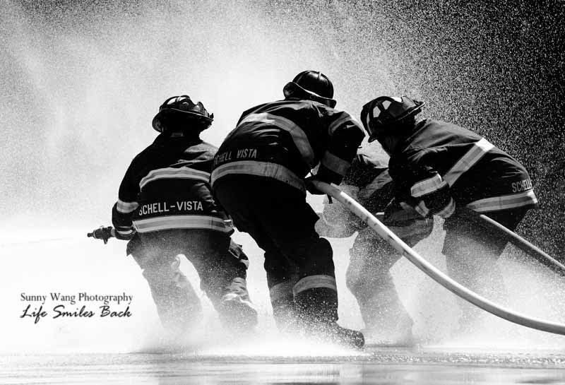 Sunny Wang Photography - Life Smiles Back: Firefighter Water Fight!