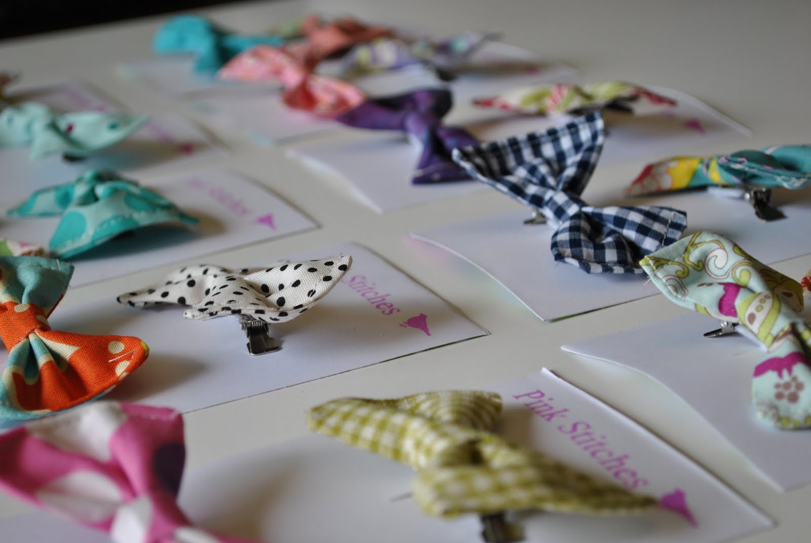 Pink Stitches: Some Bows and Some Good News!