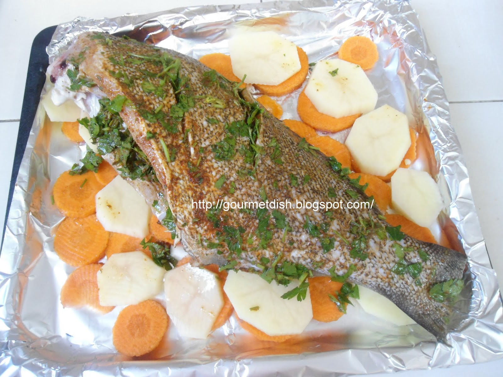 Gourmet Dish: Roast Hamour Fish with Roast Vegetables in the Oven