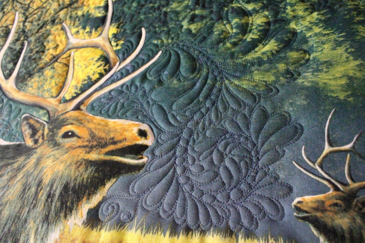 Sarah Lynn's Quilting: Half Done Quilting the Elk Panel Quilt