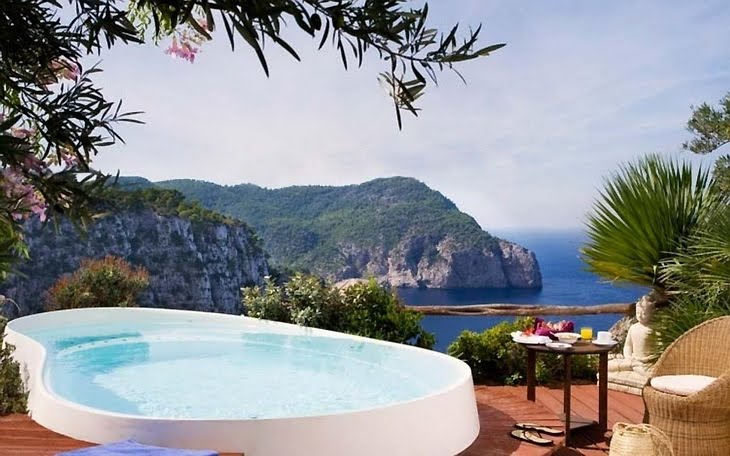 ESTILO RUSTICO: EXTERIORES RUSTICOS EN HOTEL DE IBIZA