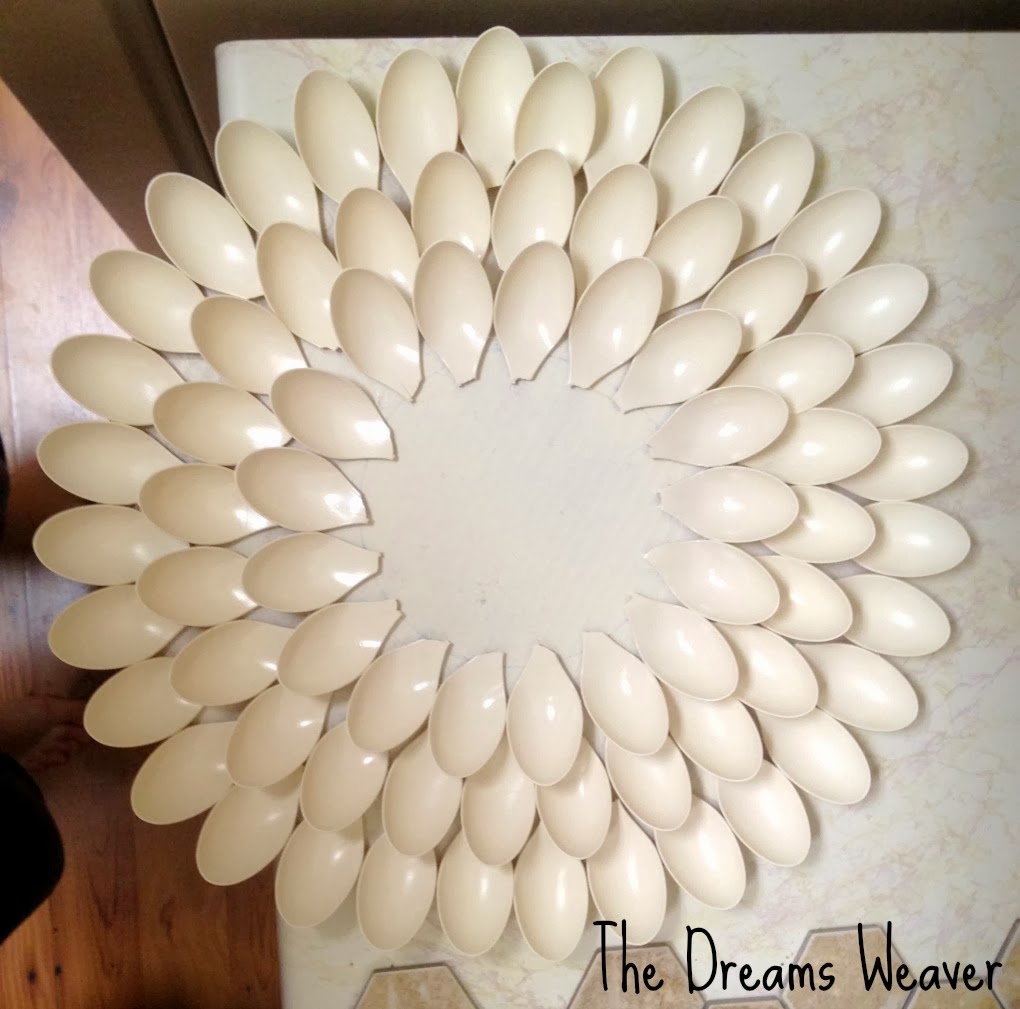 The Dreams Weaver: Upcycled Plastic Spoon Sunburst Mirror