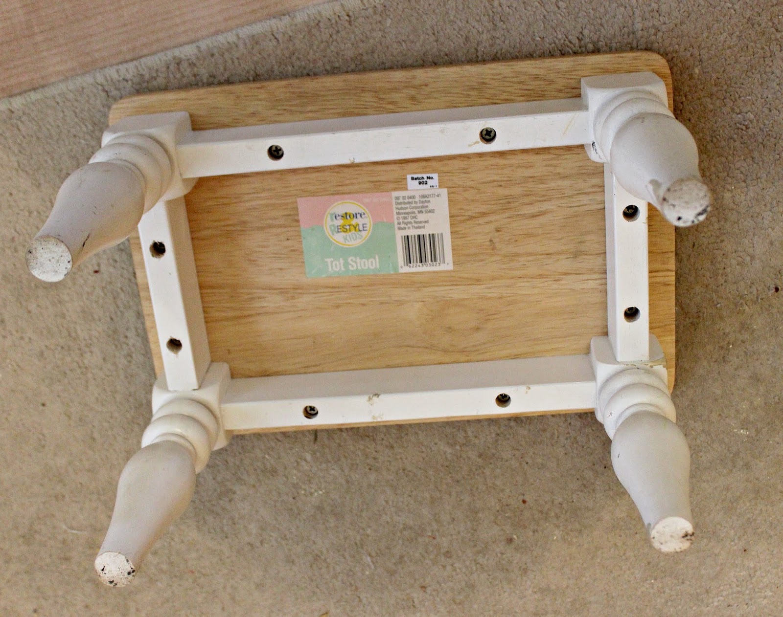 Adding Stool Legs to an Old Crate - Organized Clutter
