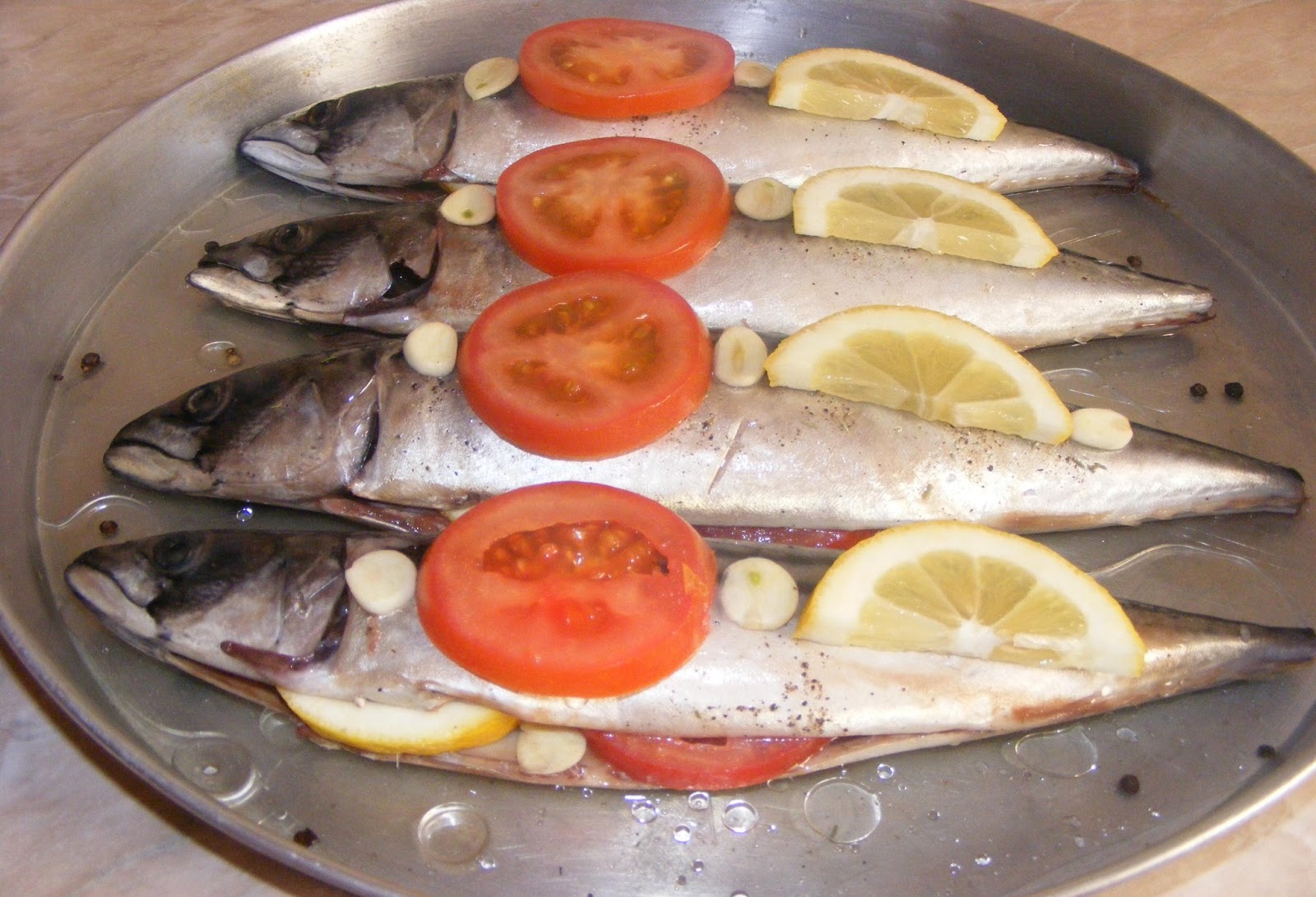 Macrou la cuptor Retete Macrou La Cuptor Cu Sos De Rosii Si Usturoi ...