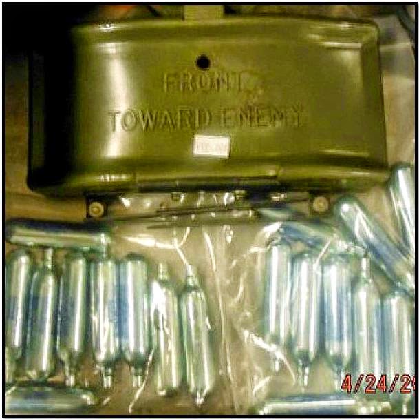 TSA Week in Review: 49 Firearms, Two Live Flashbang Grenades, a Replica ...