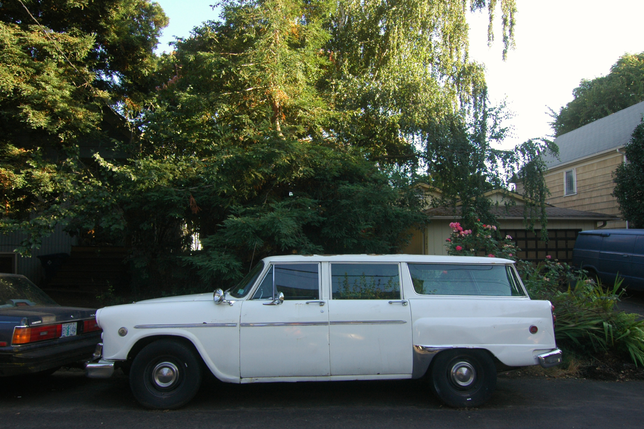 OLD PARKED CARS.: 1971 Checker Marathon Wagon.