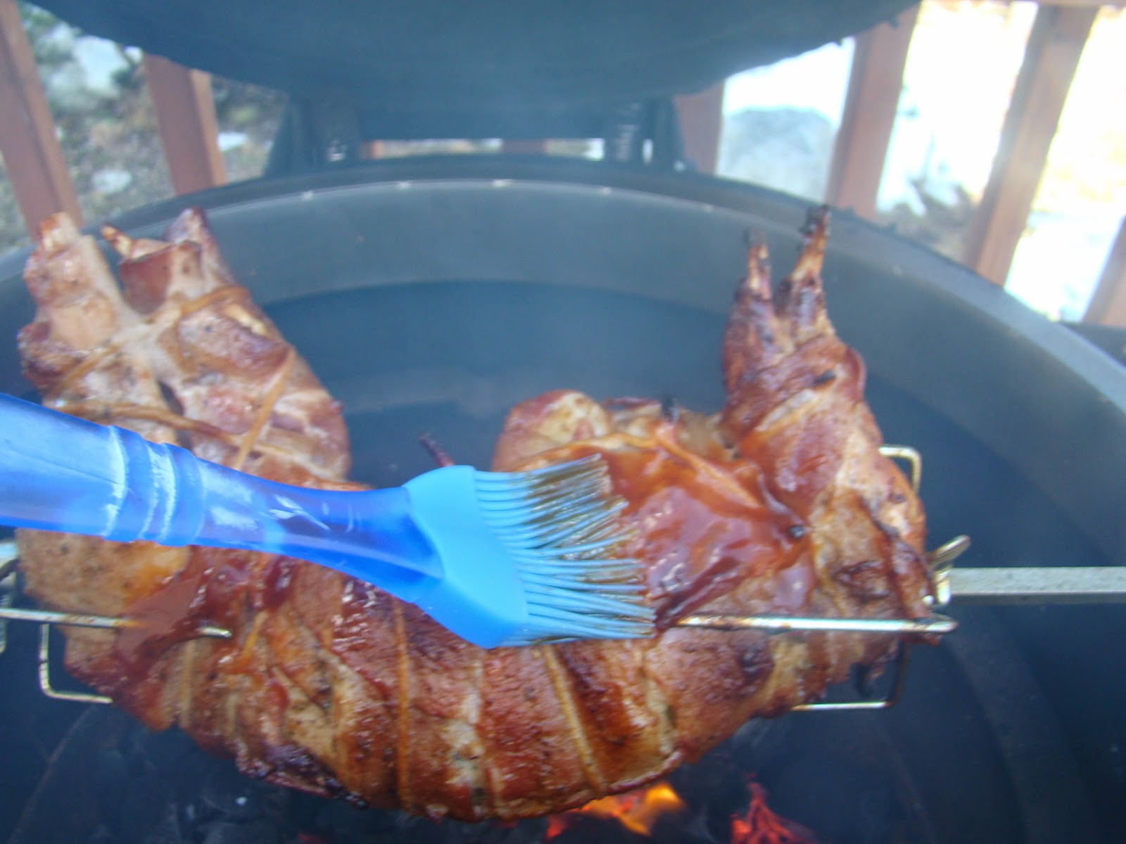 HRM CREATIVE BBQ: Bacon wrapped Rotisserie Rabbit on the BBQ