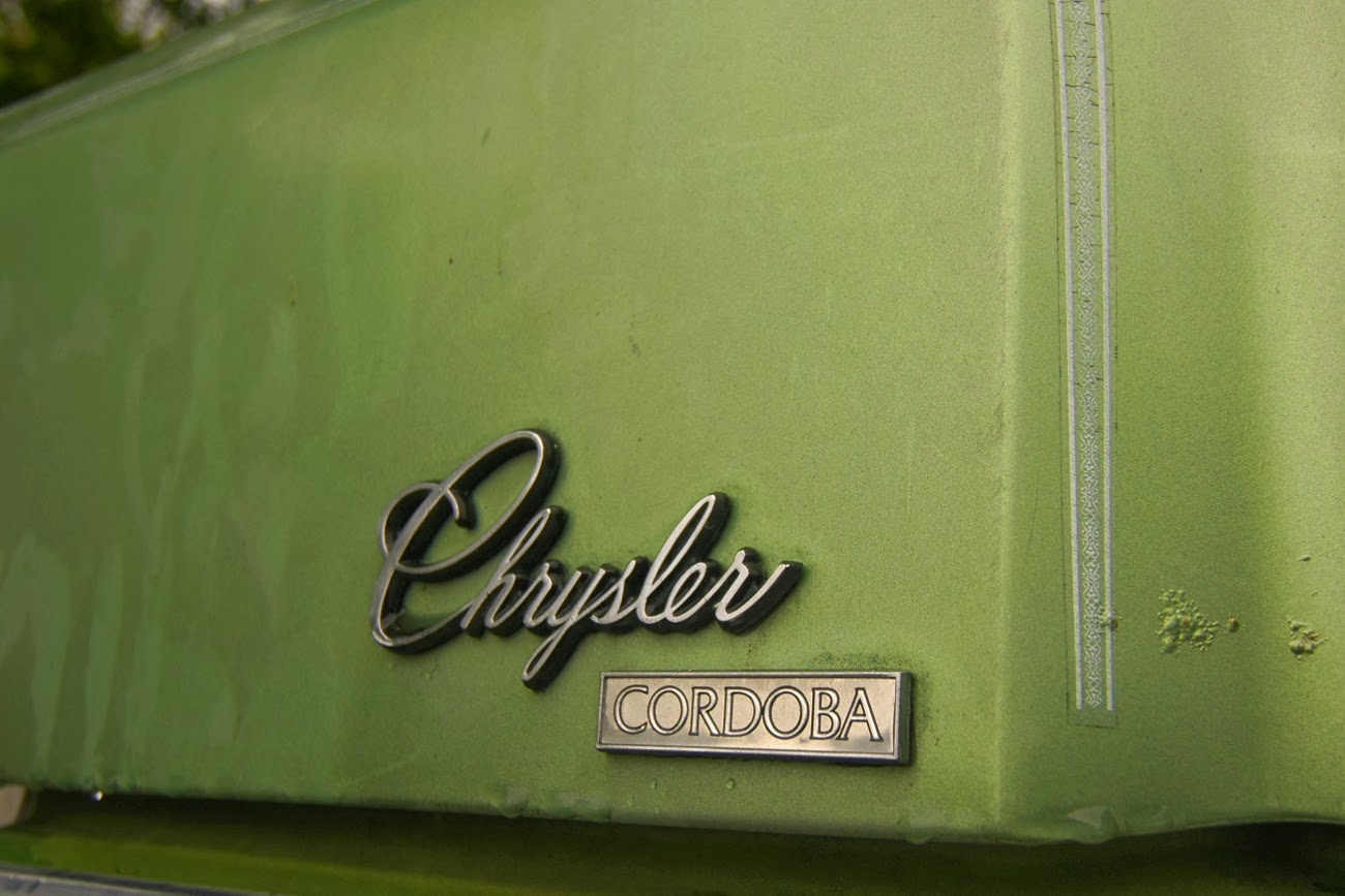 OLD PARKED CARS.: 1977 Chrysler Cordoba.