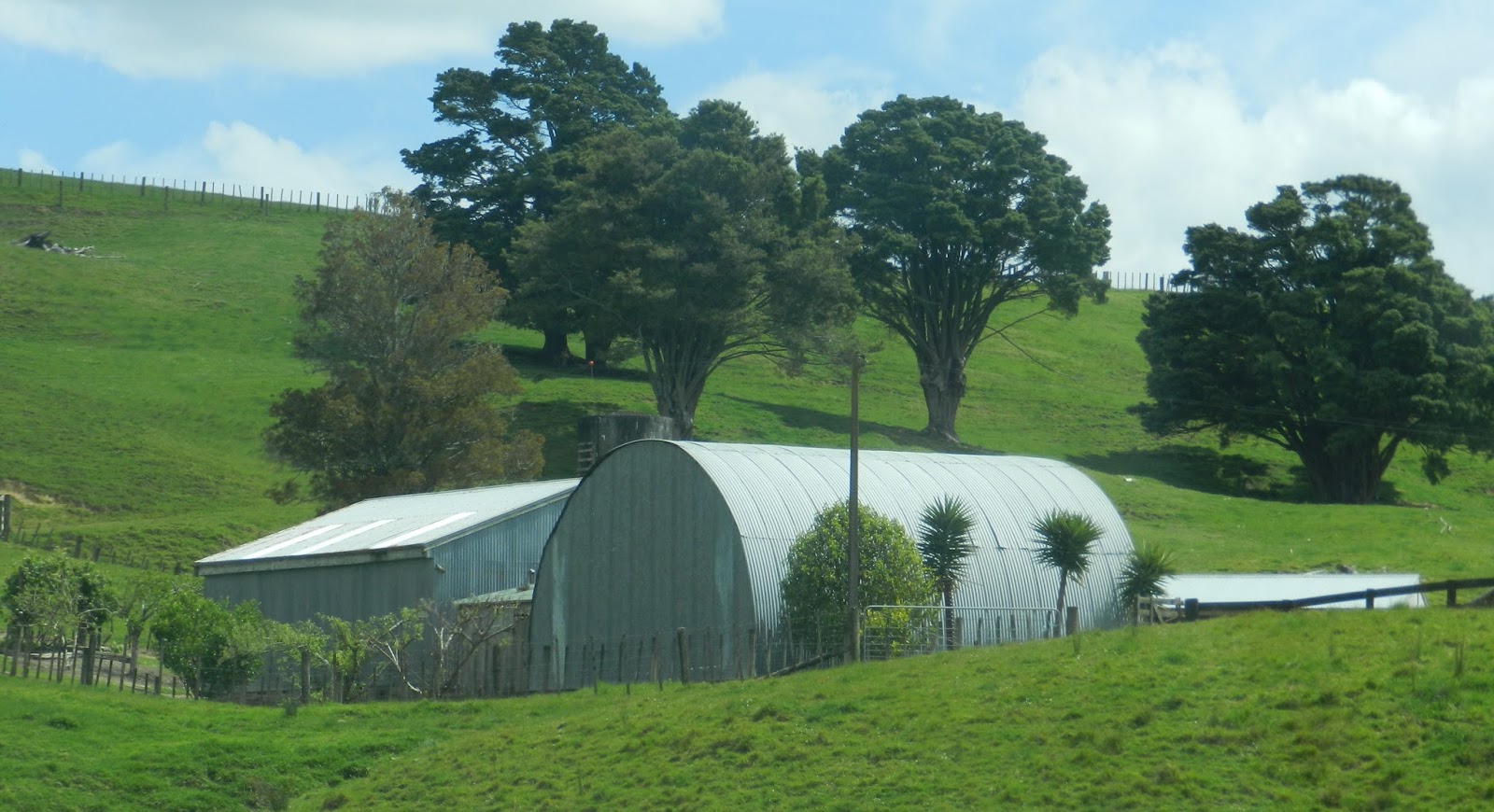 The Paddock: Half round barns