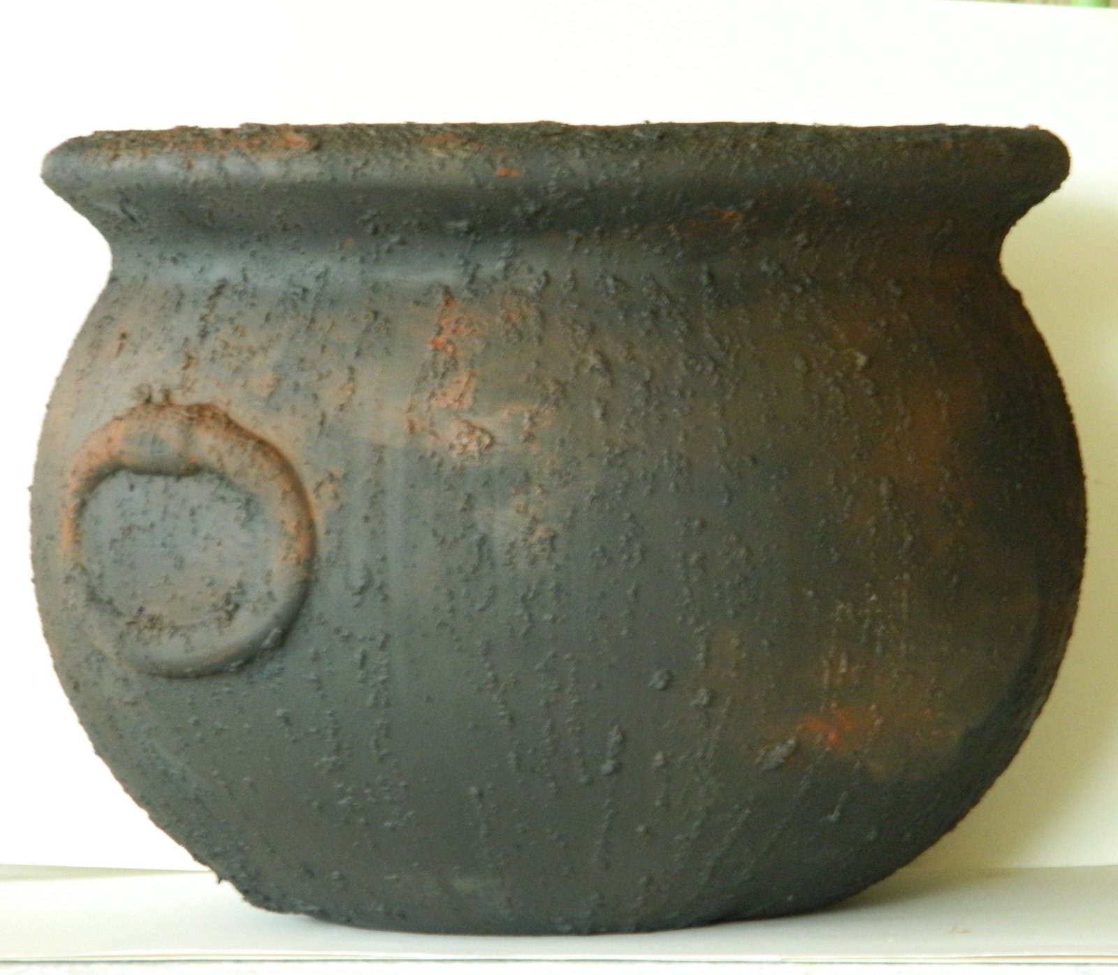 The other side of Deb: Altered plastic cauldron