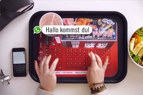 Tray Typer allows you to enjoy KFC foods while still using your gadget