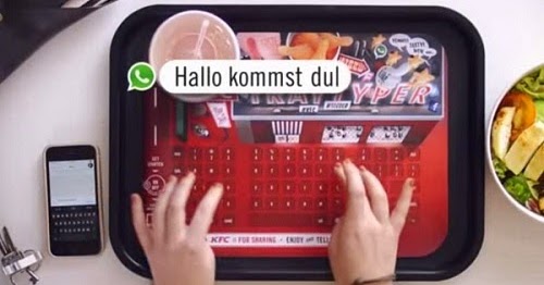 Tray Typer allows you to enjoy KFC foods while still using your gadget