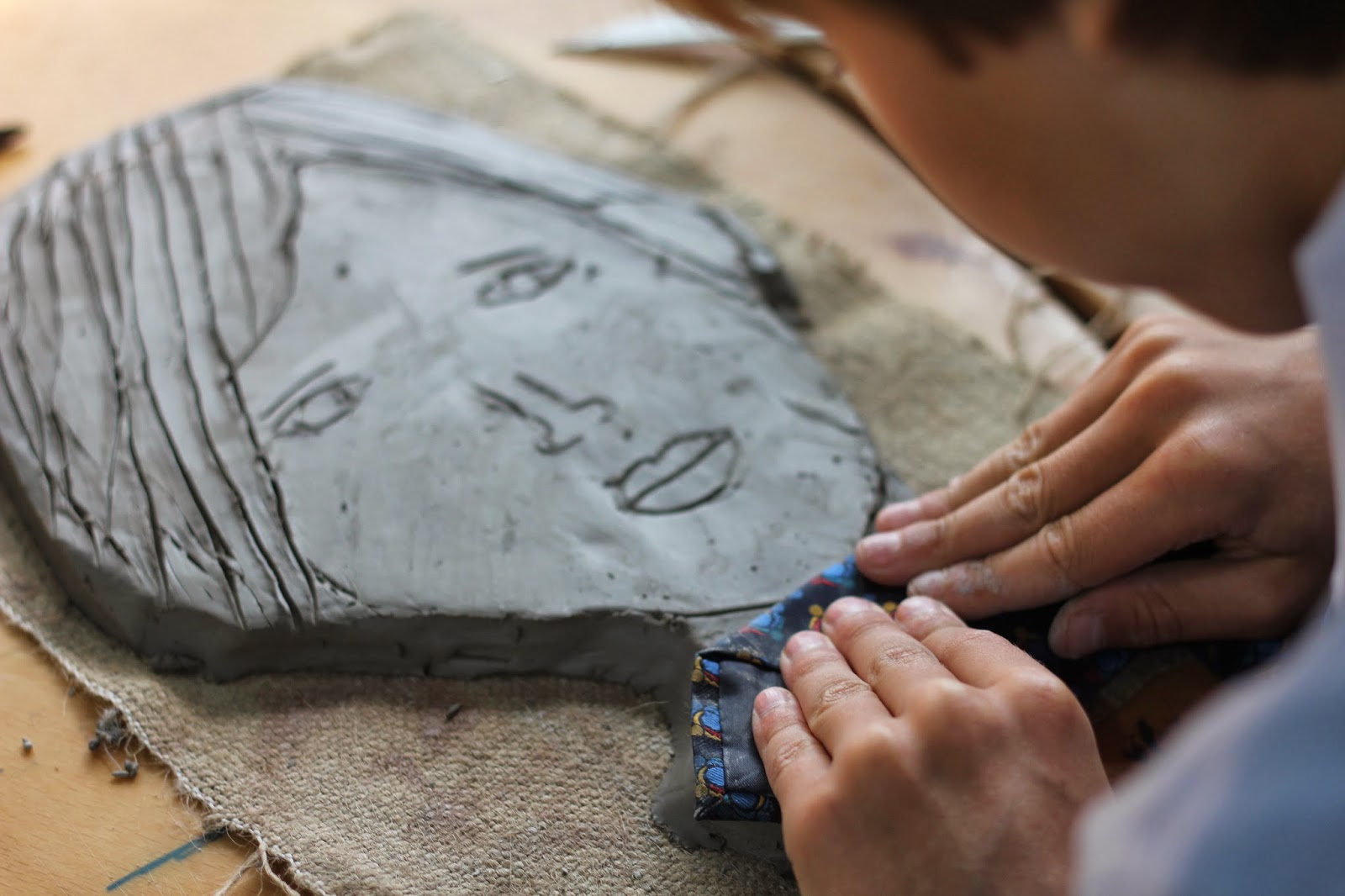 Making Our Mark: Grade 4 Relief Self-Portraits