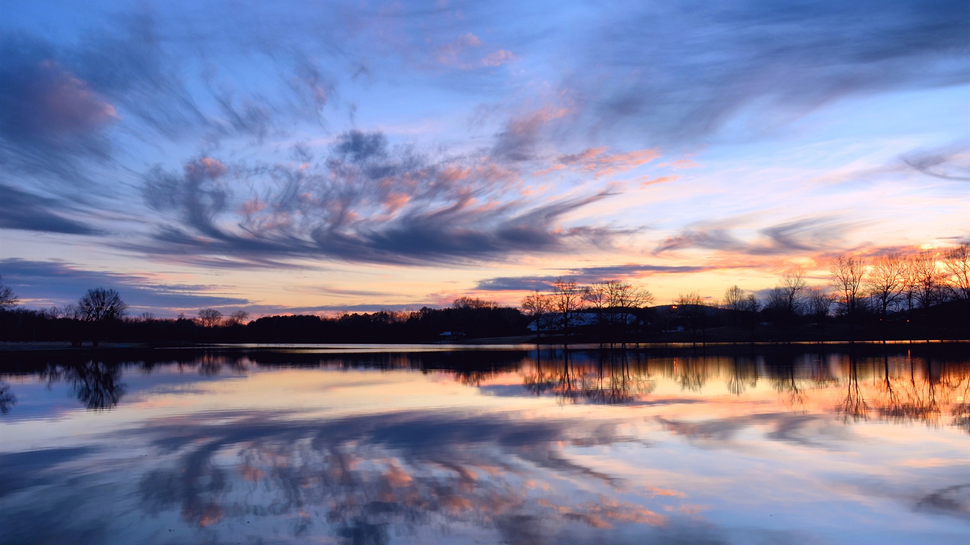 Beautiful sunset calm lake reflection in the water shore trees Sky ...