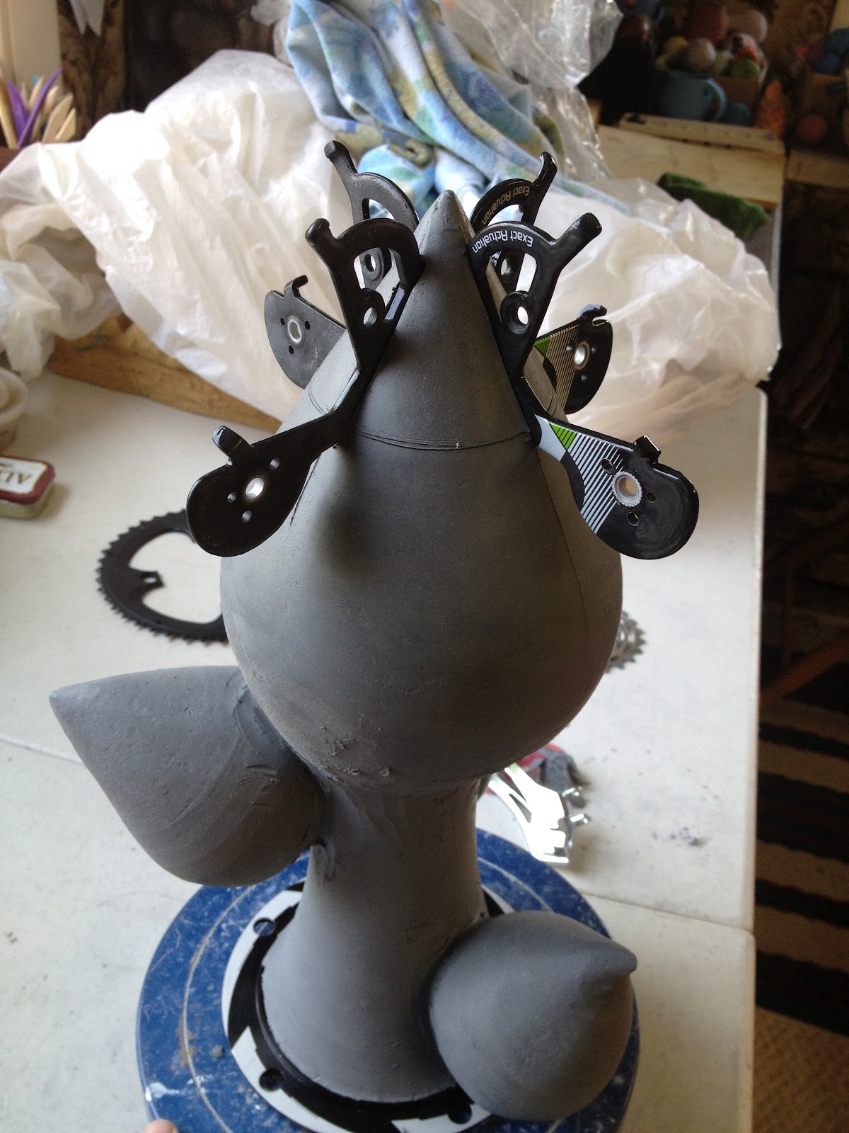 Rachel Dorn Ceramic Sculpture: Bike Part with Clay: Gears