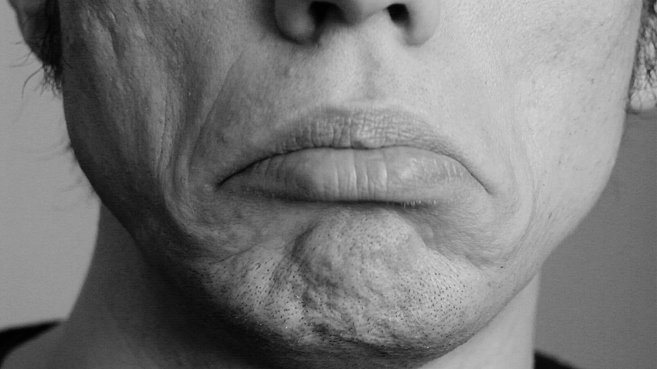 facial references for animation: lips frown [is, front, 60fps, ECU]