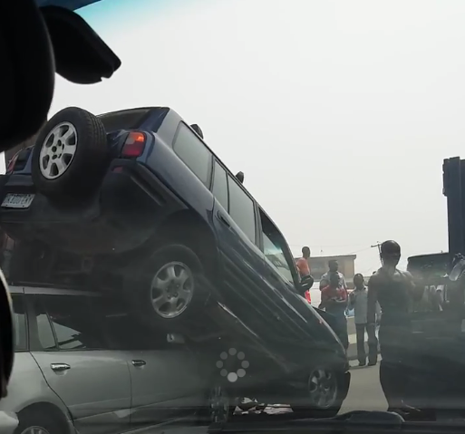 SUV climbs over another car in accident on Oshodi-Apapa road (photos)