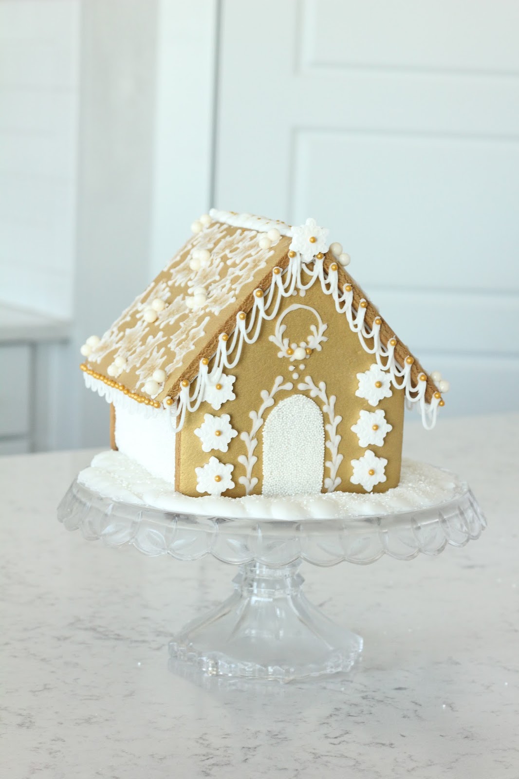 White and Gold Gingerbread House