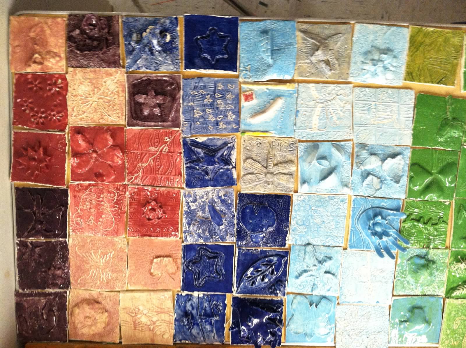 small batch art: 5th grade life cycle clay tile mural with visiting artist