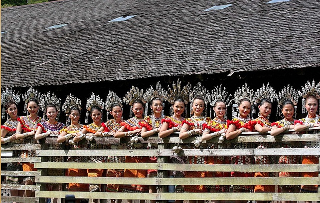 Dinosan World: Iban girls in traditional Iban costume at Rumah Panjang