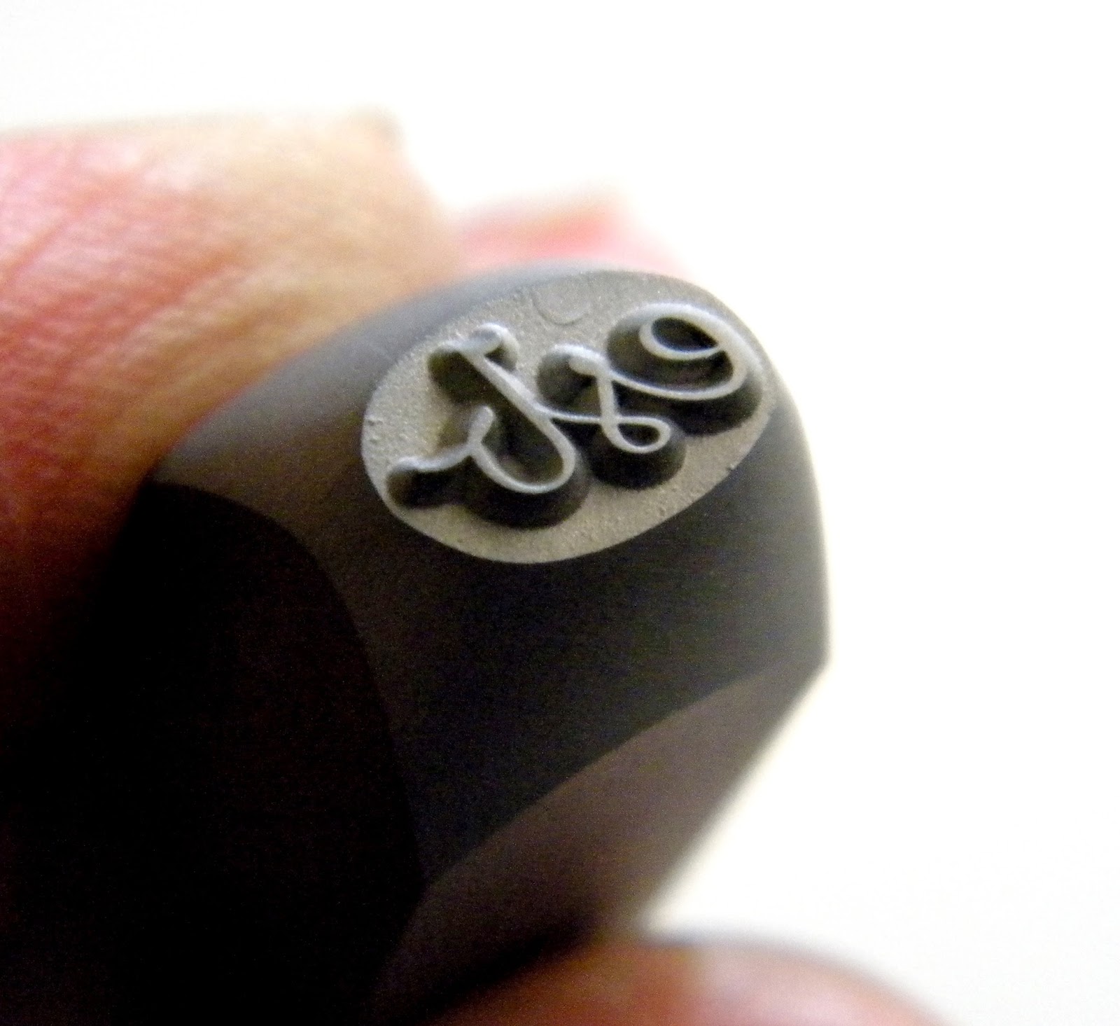 Cake and Jewelry: A hallmark stamp