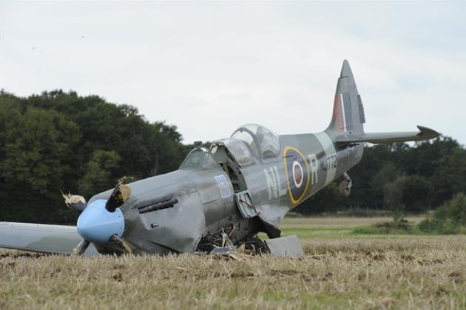 Warbirdskies: Spitfire T9 MJ772 in off field landing.