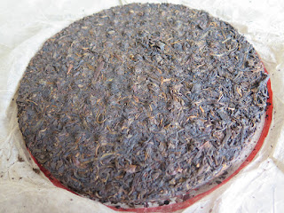 travelling teapot: 2003 Xiaguan Iron Cake