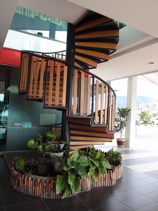 Xing Fu: WATER FEATURE UNDER STAIRCASE