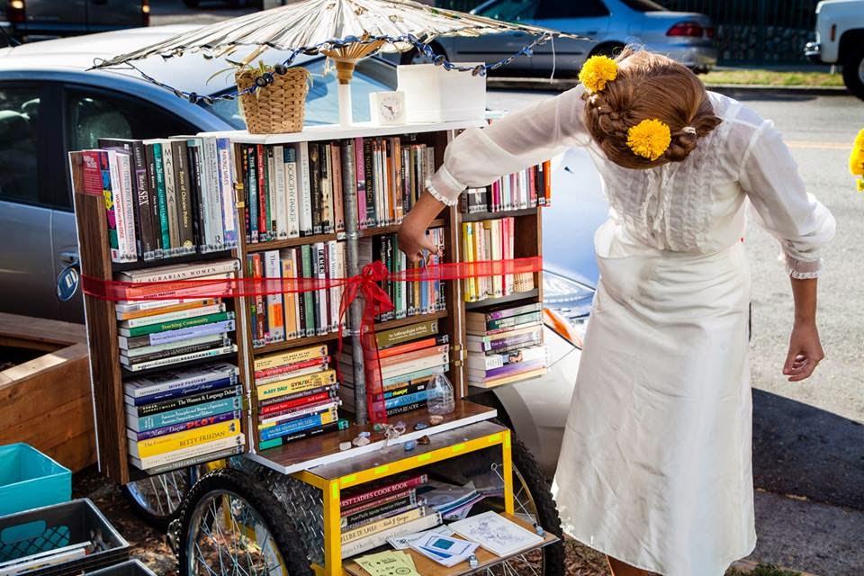 CynthiaParkhill: Feminist Library on Wheels, books on custom tricycle