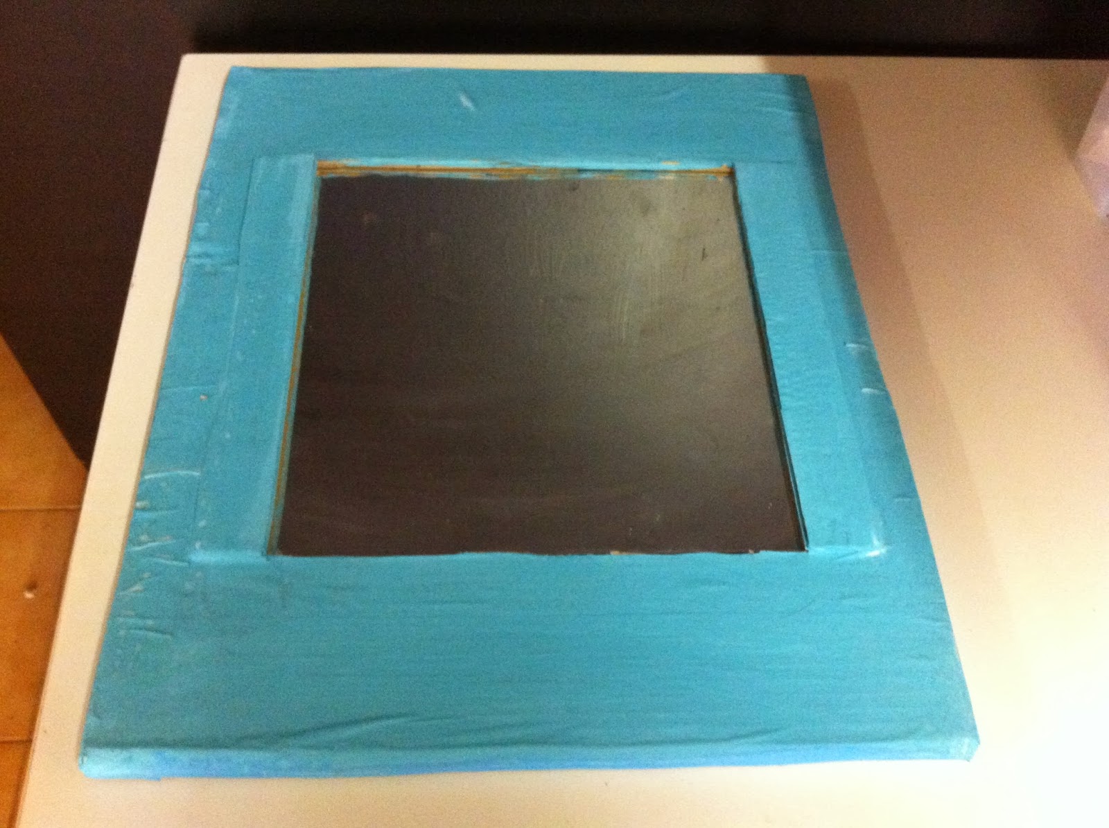 El Arte de Reciclar: Espejo con marco de cartón.