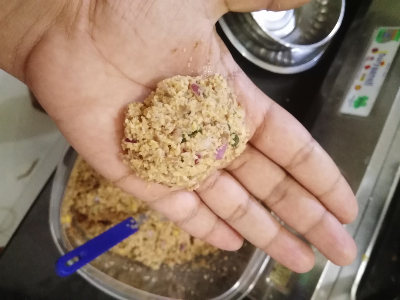 Oil got preheated keep in medium flame and start to deep fry the vaada ...