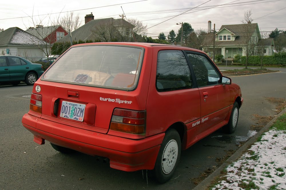 OLD PARKED CARS.: 1987 Chevrolet Sprint Turbo.