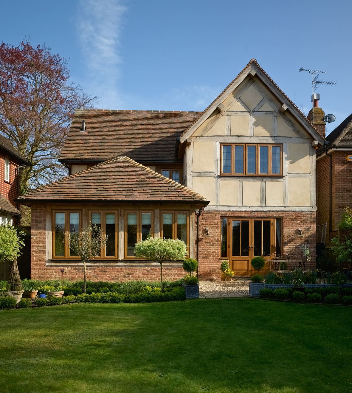 from little acorns.........: a house in a tree lined street