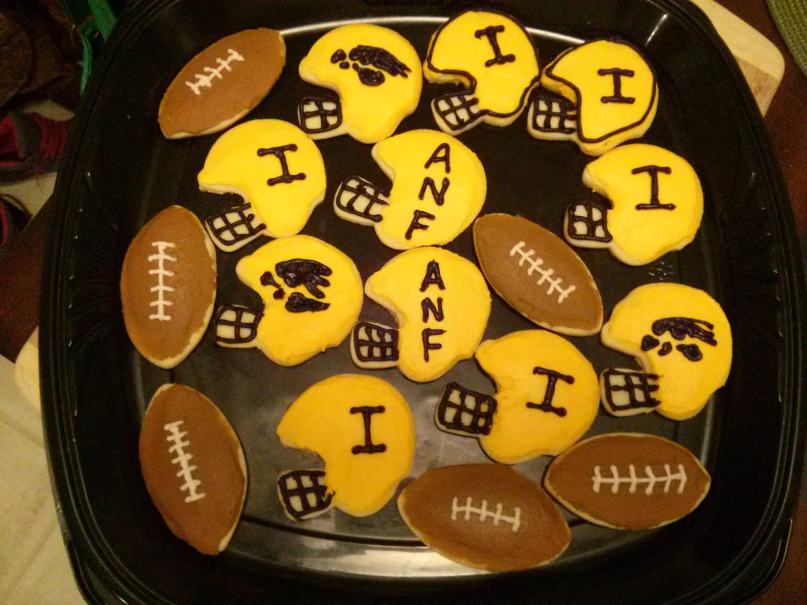 Elite Design Desserts: Iowa Hawkeyes Helmets & Football Cookies