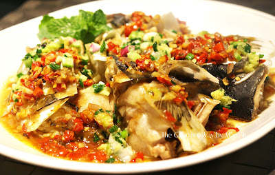 Steamed Fish Head with Homemade Chopped Chili Pepper Sauce . 自家剁椒蒸魚頭