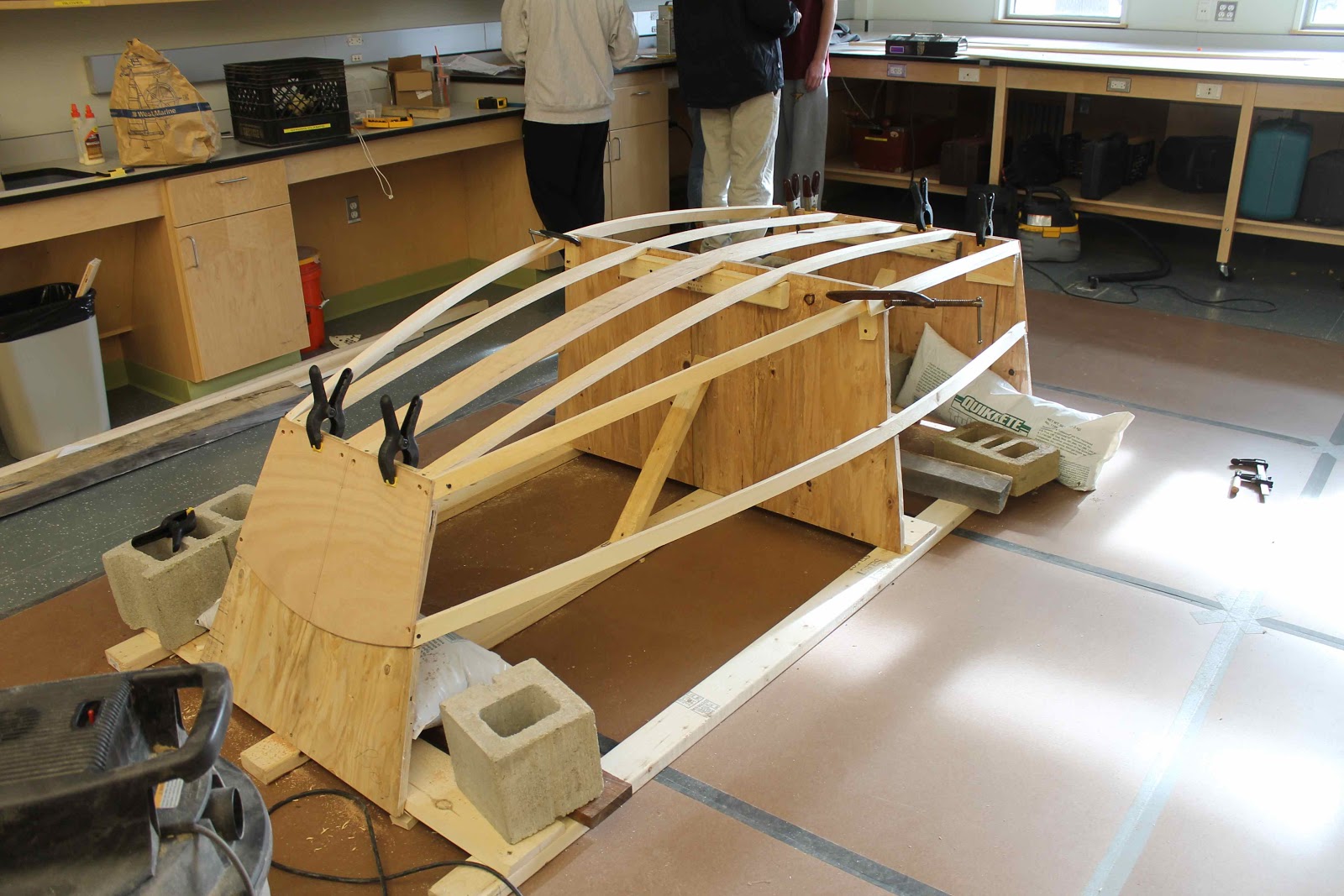 Wooden Boat Building at Brooks School: Day 6 Epoxy Stringers and Sides