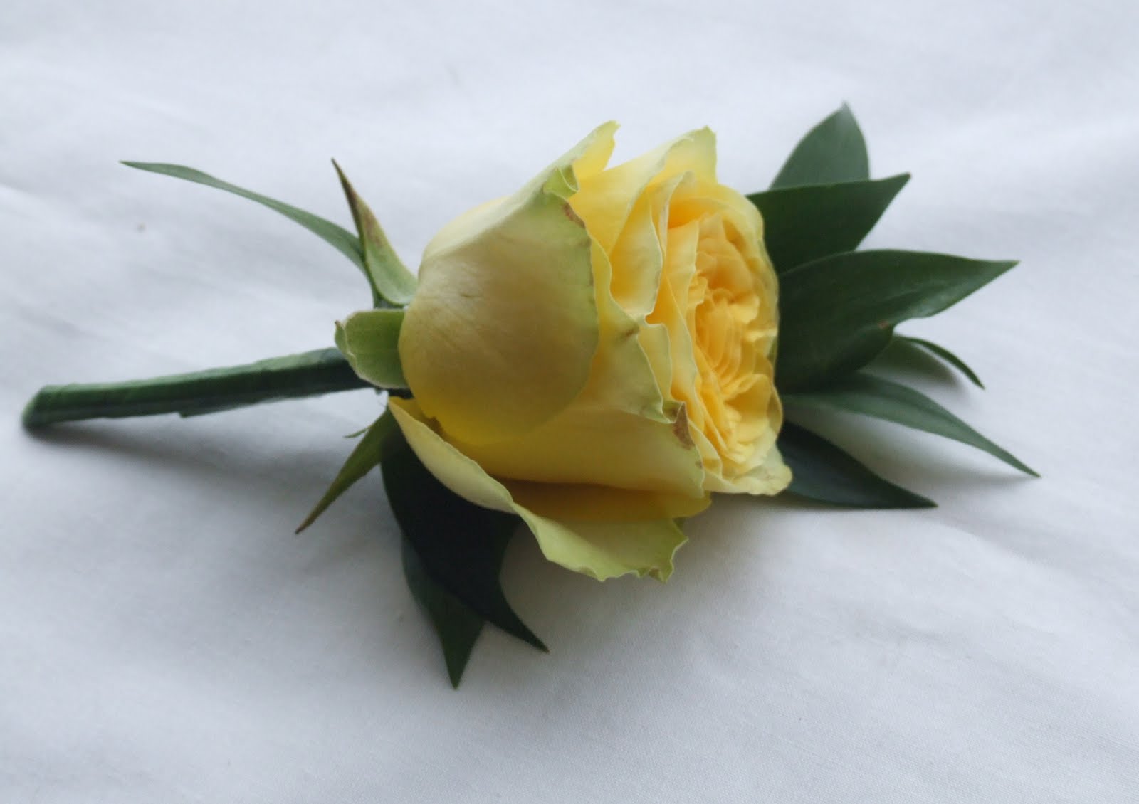 RJ's Florist: Purple and Yellow wedding flowers.
