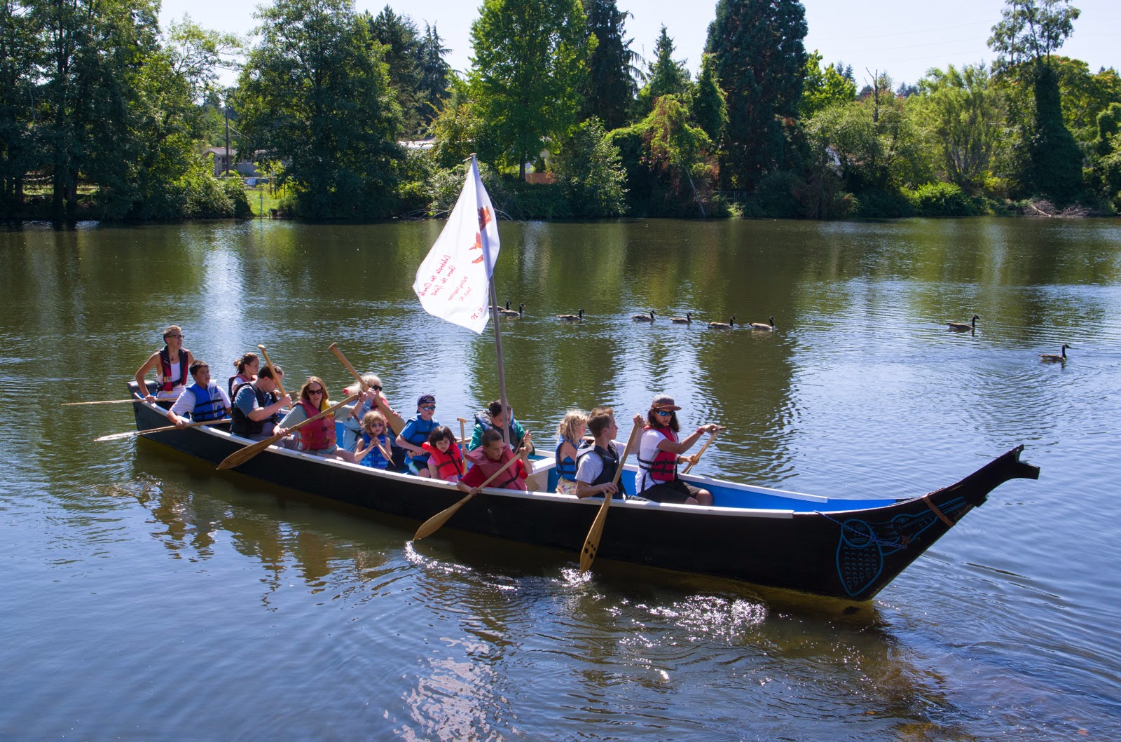 Shoreline Area News: Giant canoe rides popular at SummerSet Arts Festival