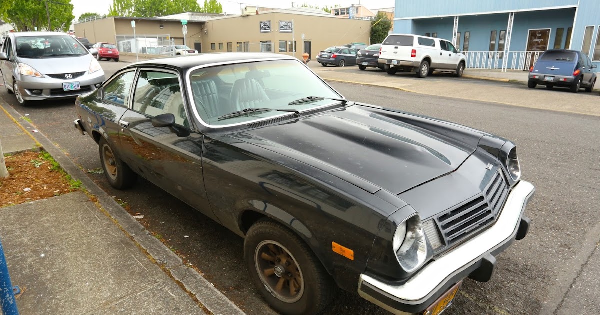 OLD PARKED CARS.: 1975 Chevrolet Vega.