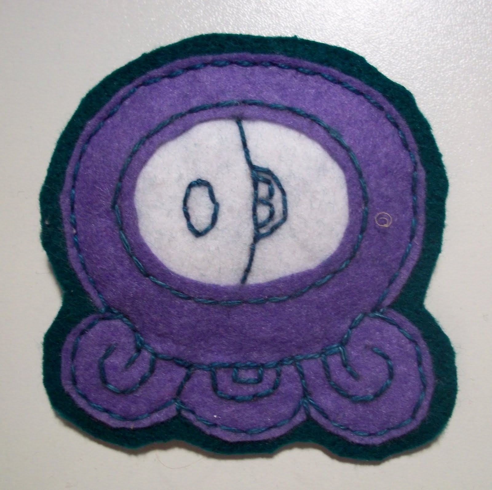 Broches mayas: Broche del día Muluk del calendario Tzolk´in