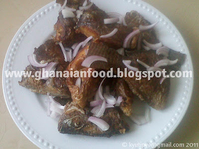 Ghanaian Food: Waakye with Fried Fish and Wele stew